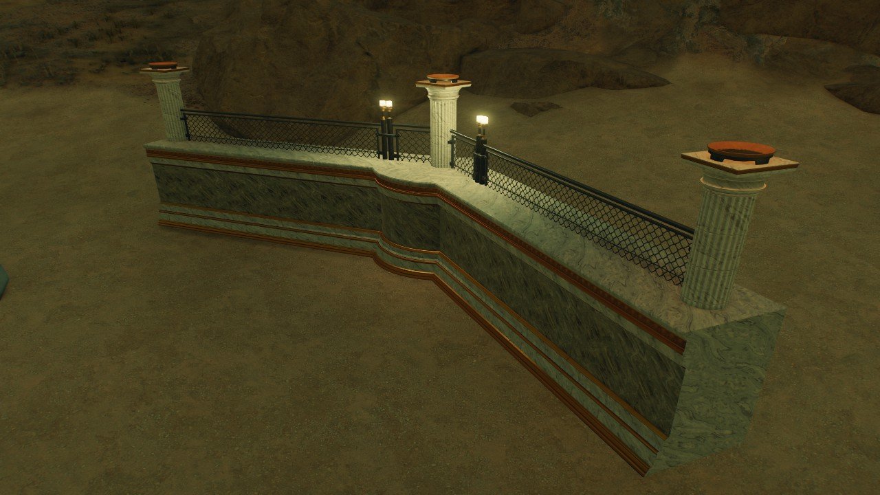 Marble wall with wire fence and columns - (inward facing corner ...